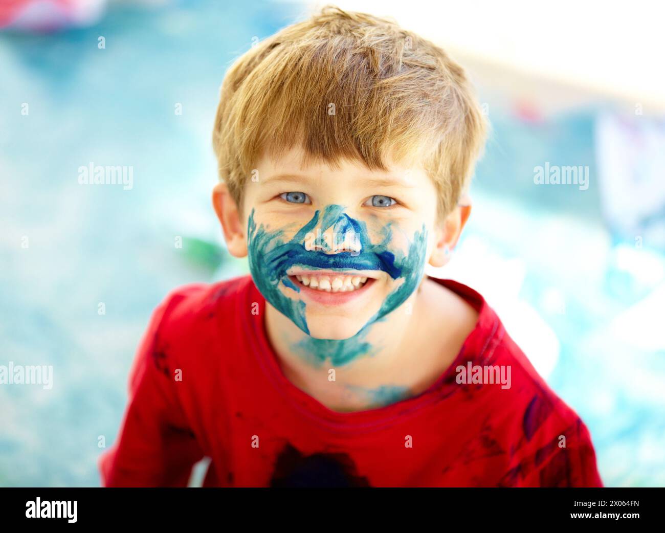 Children, paint and smile or playing portrait, happy boy in preschool ...