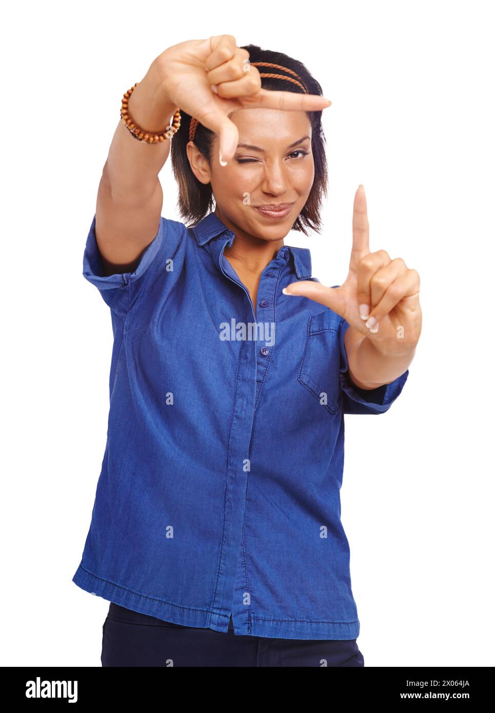 Portrait of woman, wink and frame in studio for selfie, photo or ...