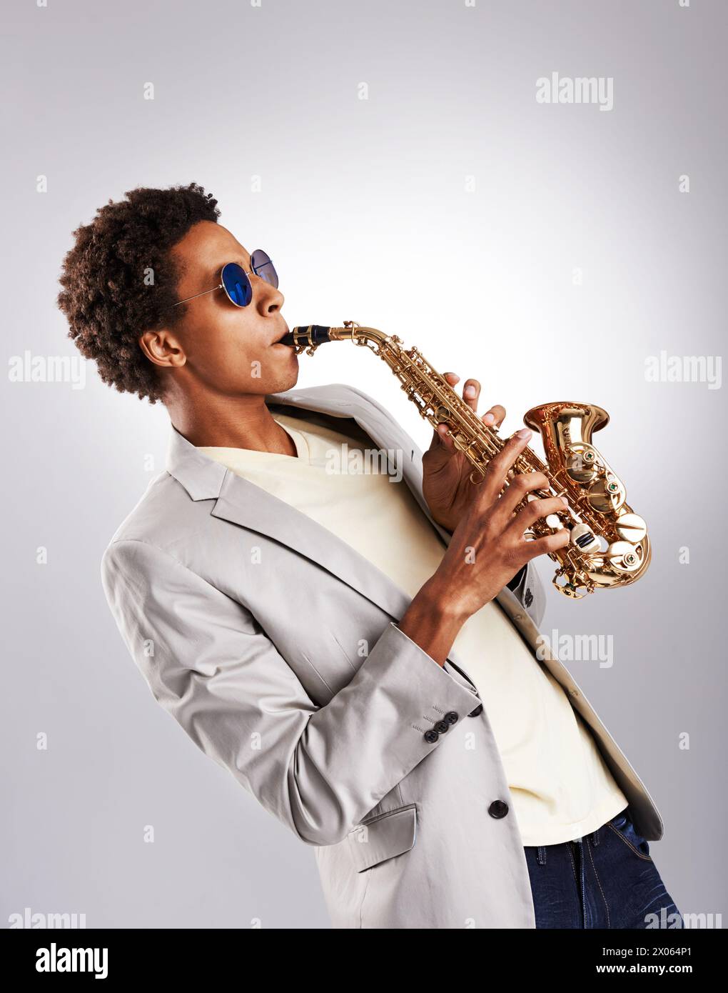 Saxophone, man and performance with jazz artist, creative and music on ...