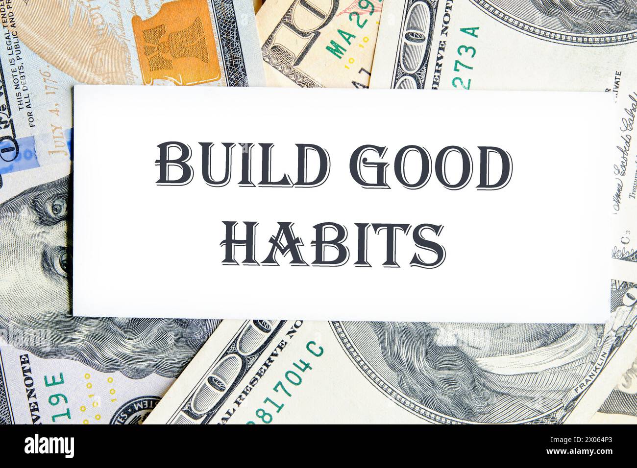 BUILD GOOD HABITS motivational concept text on a white business card ...