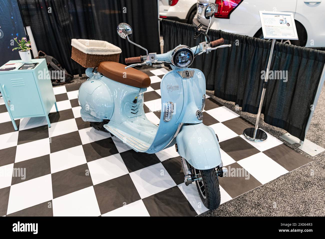 New York City, USA - March 27, 2024: Retro Aventura-X Electric Scooter Vespa style blue color at ...