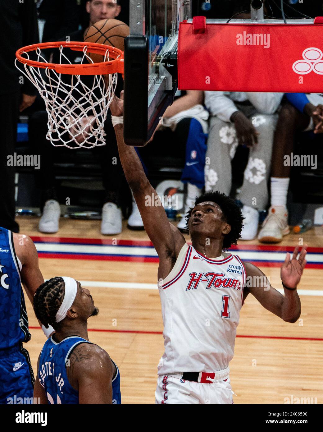 Houston, USA. 9th Apr, 2024. Amen Thompson (R) of Houston Rockets lays ...