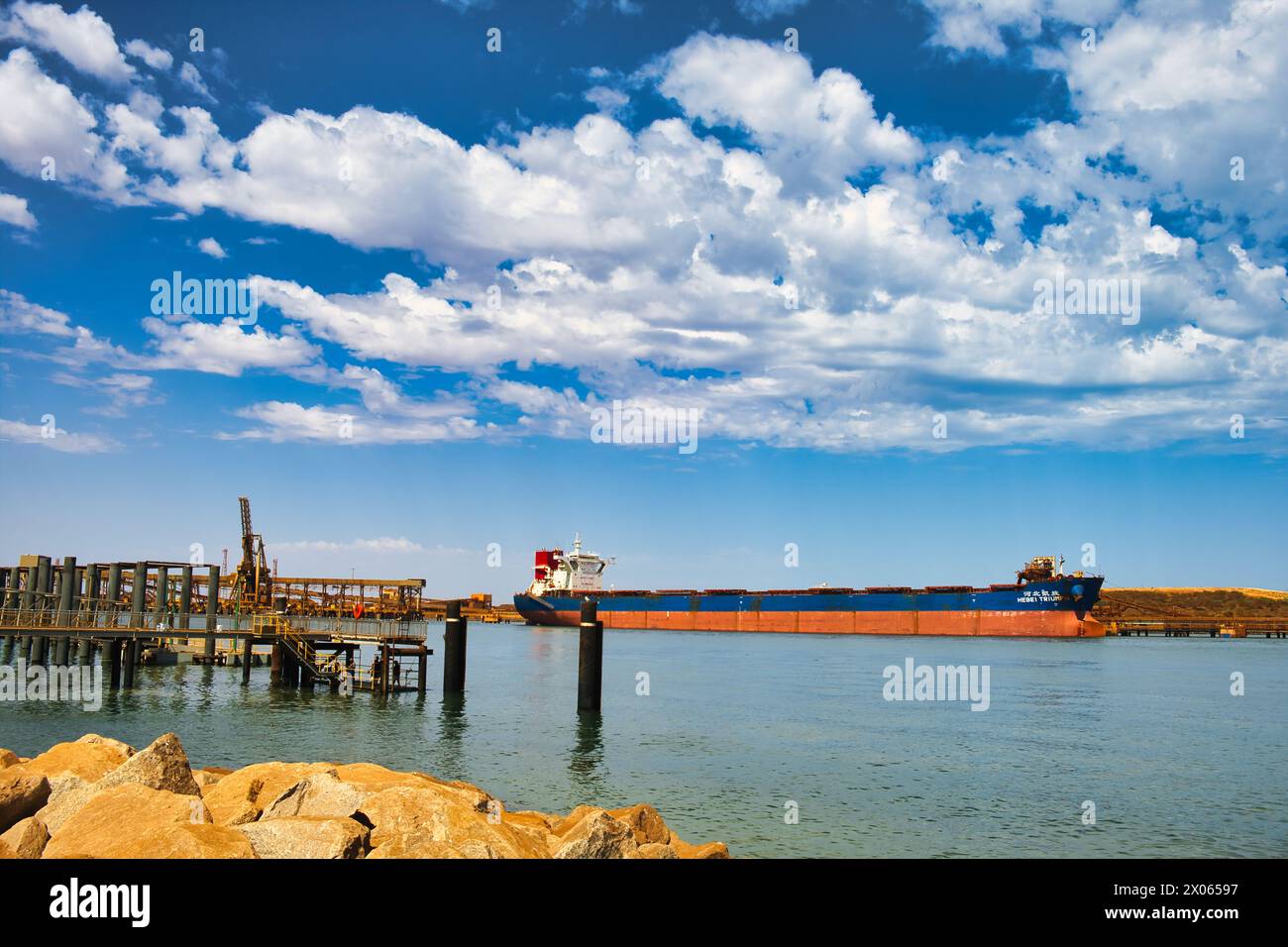 Chinese bulk carrier is being loaded with Australian iron ore in the ...