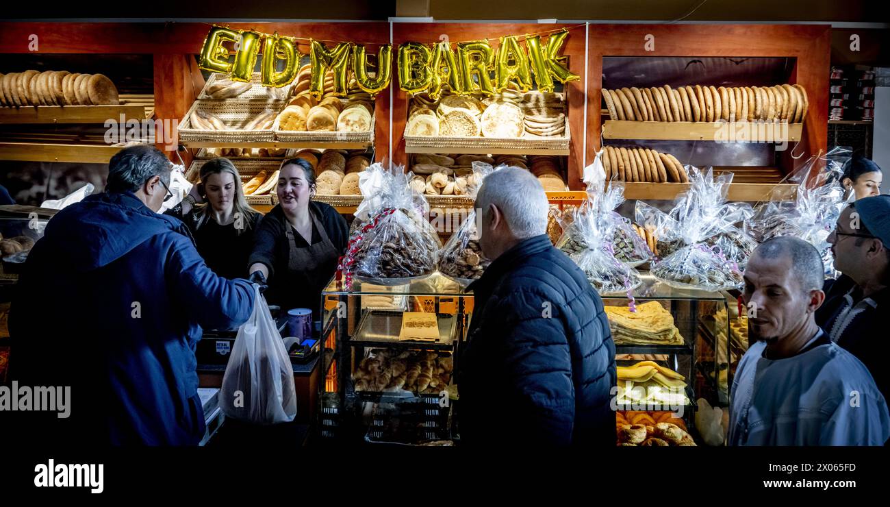 ROTTERDAM - Busy at a bakery during Eid-al-Fitr, also known as Eid-al ...