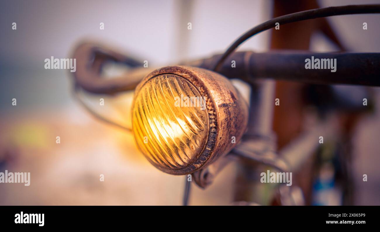 Vintage headlight of an old bicycle close-up photo. A bicycle headlight ...