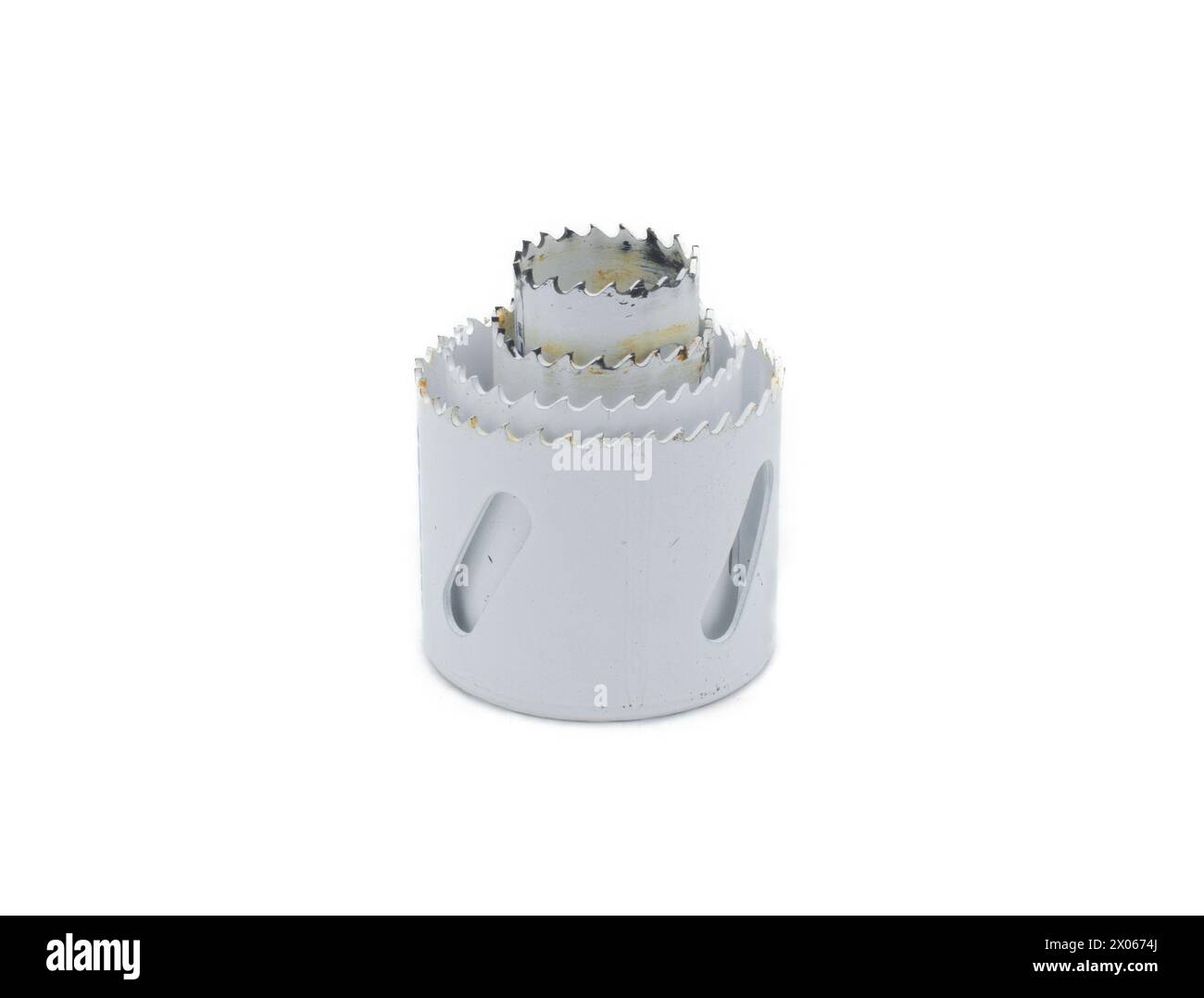 a set of 4 used round hole metal saw blades standing upright fit inside ...