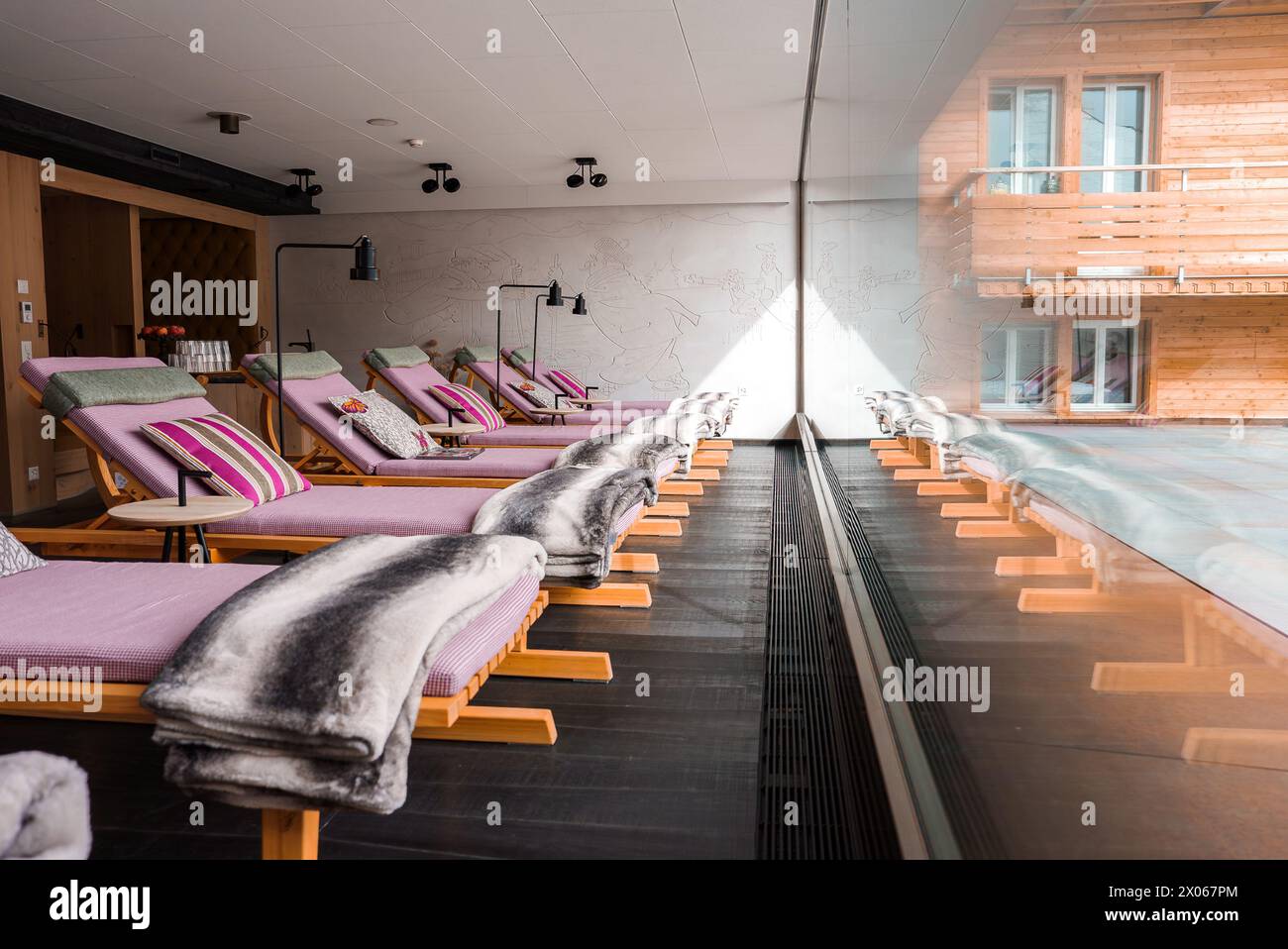 Indoor pool lounge chairs hi-res stock photography and images - Alamy