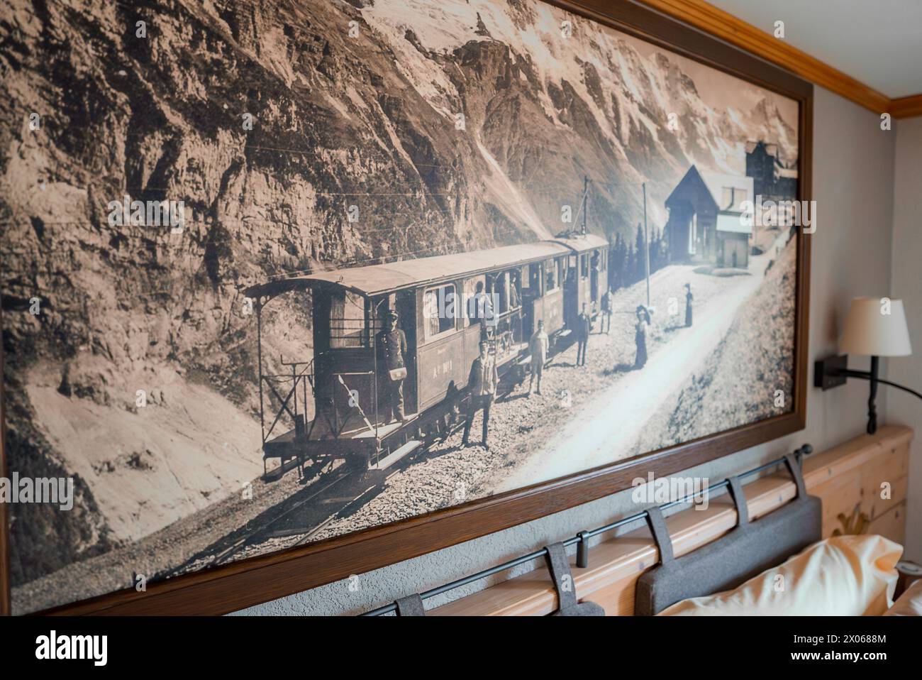Historical Black and White Train Picture Above Bed in Cozy Bedroom ...