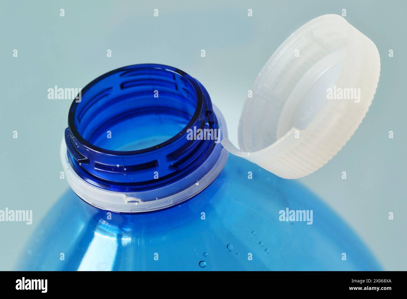 Close-up of cap attached to the neck of the plastic water bottle Stock ...