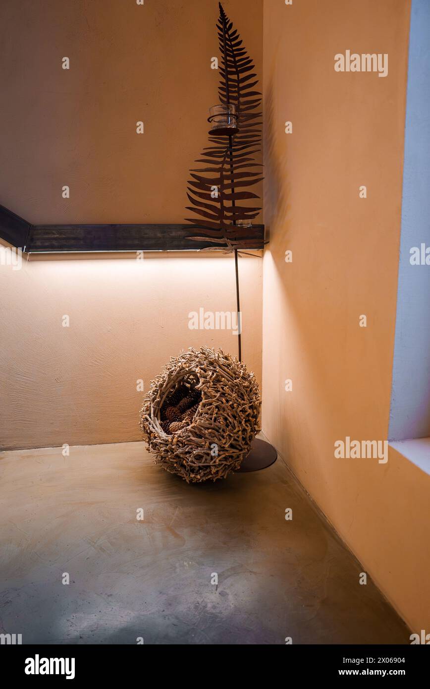 Minimalist Corner with Fern Sculpture and Nest like Object Stock Photo ...
