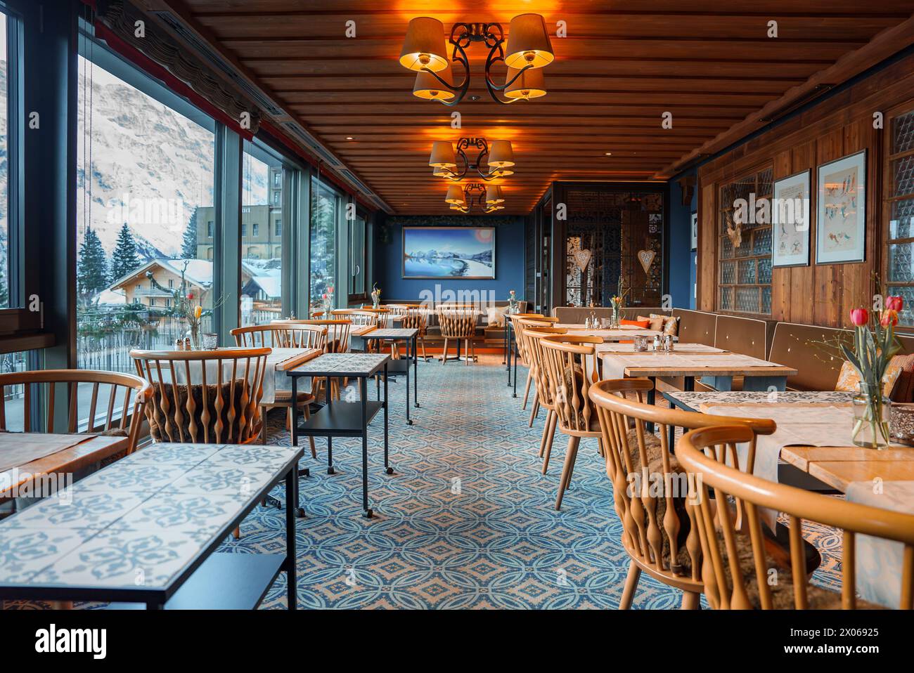 Cozy, Rustic Dining Room with Mountain View in Alpenspur Stock Photo ...
