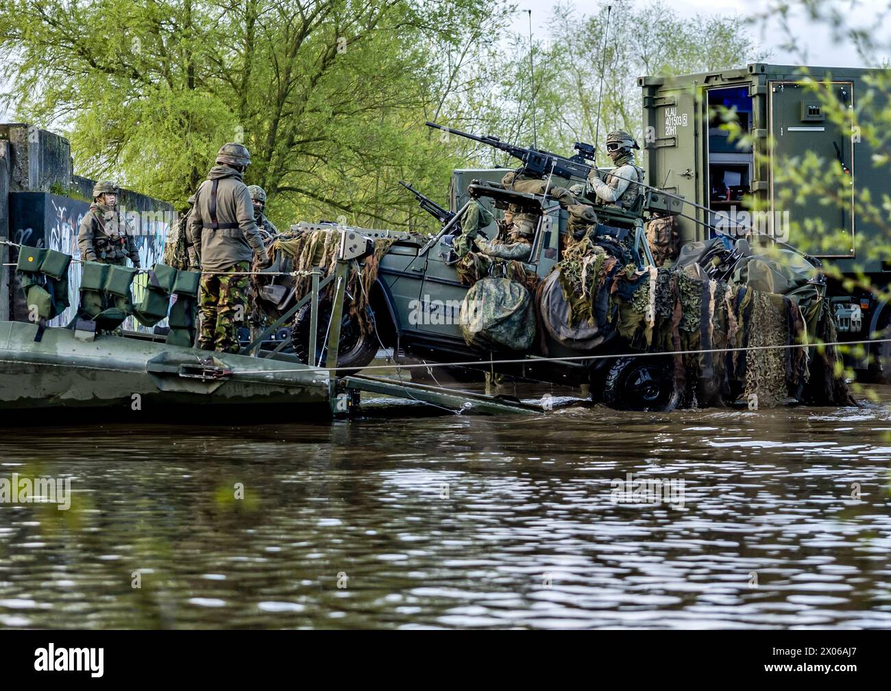 WELSUM - Soldiers cross the IJssel with army vehicles on their way to ...