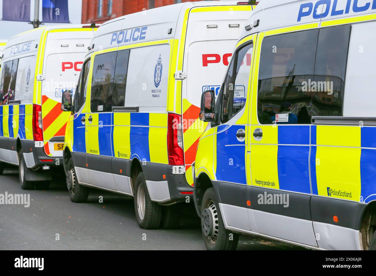Police Scotland transit people carrier vehicles, parked outside a ...