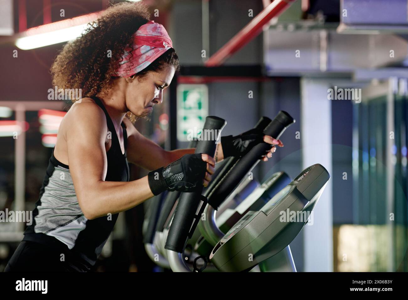 Fitness, gym or woman on stepping machine for a cardio workout and body ...