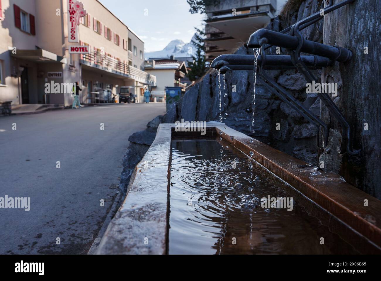 Traditional Alpine water trough in Murren ski resort, Switzerland Stock ...