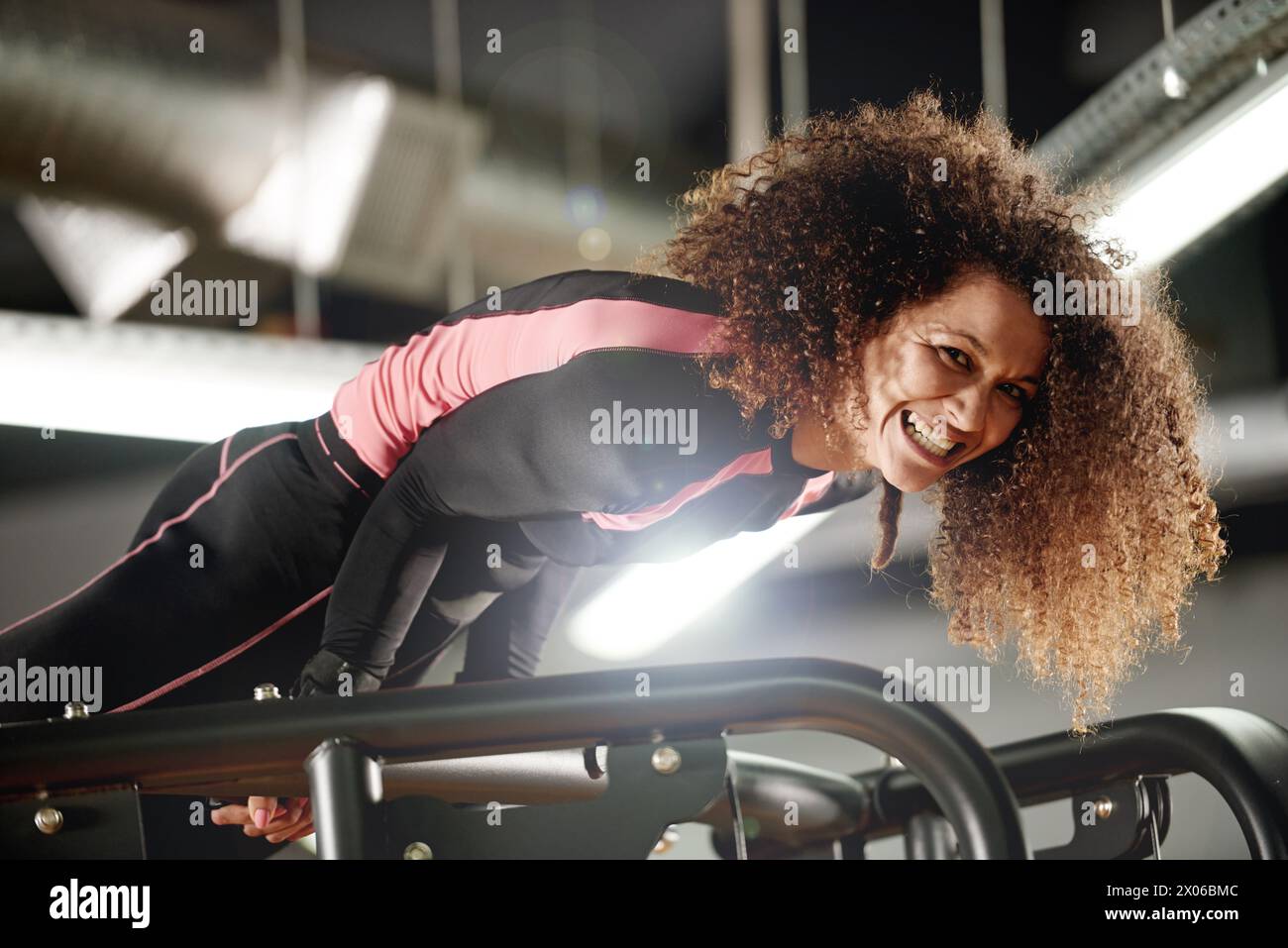 Gym, bar or portrait of flexible woman for fitness exercise or workout ...