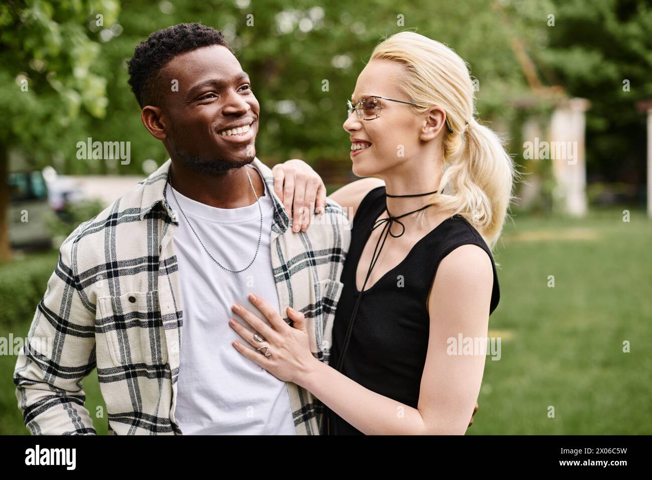 A multicultural couple, an African American man and a Caucasian woman ...