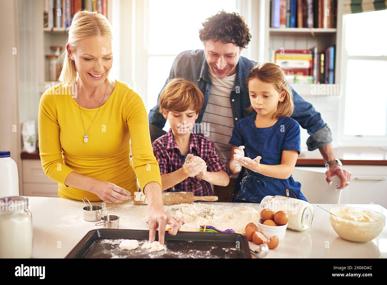 Family, baking or dough in home or kitchen for breakfast, cookies or ...