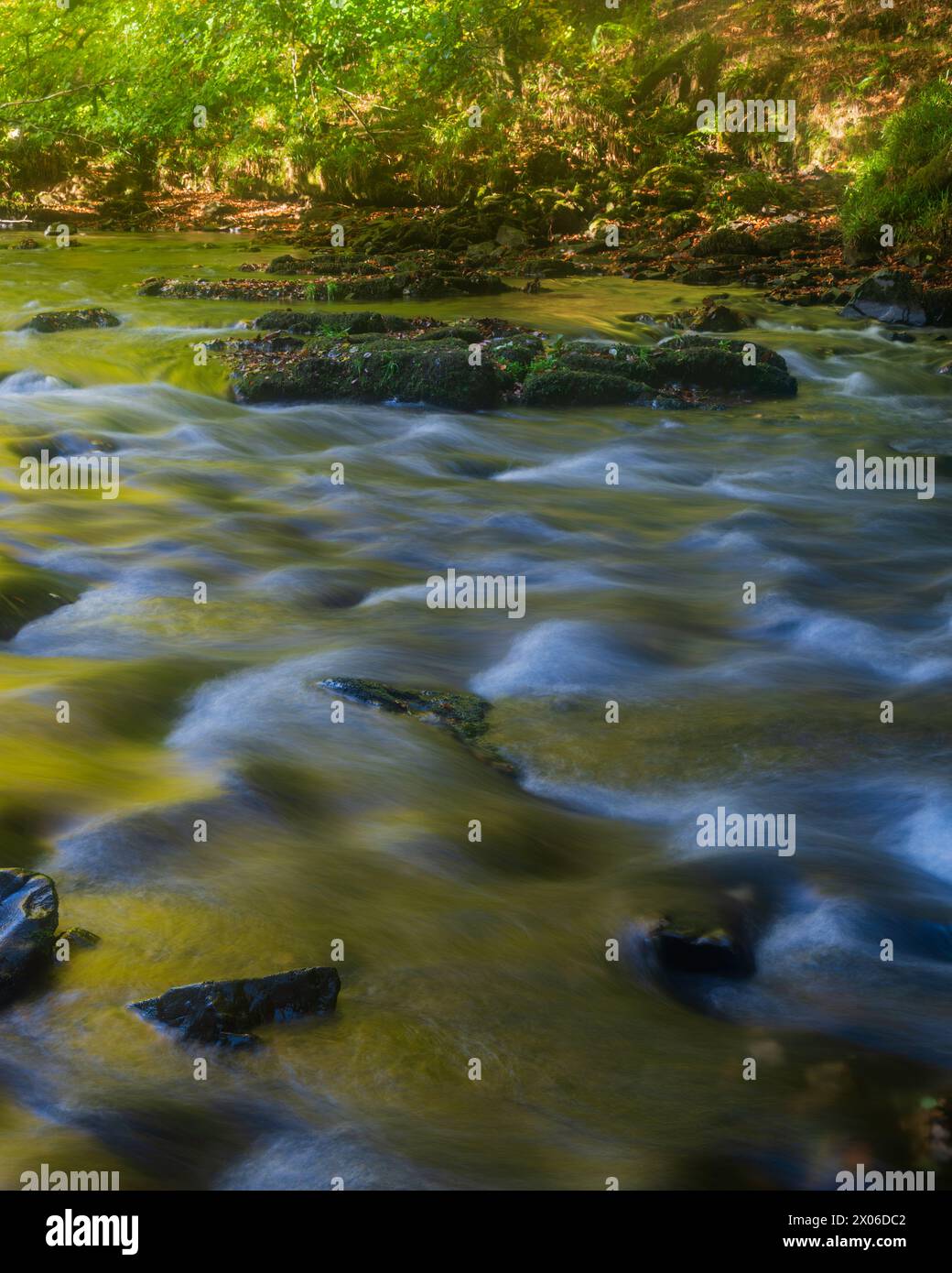 River Barle flowing over the boulders in Shircombe Slade in Exmoor ...