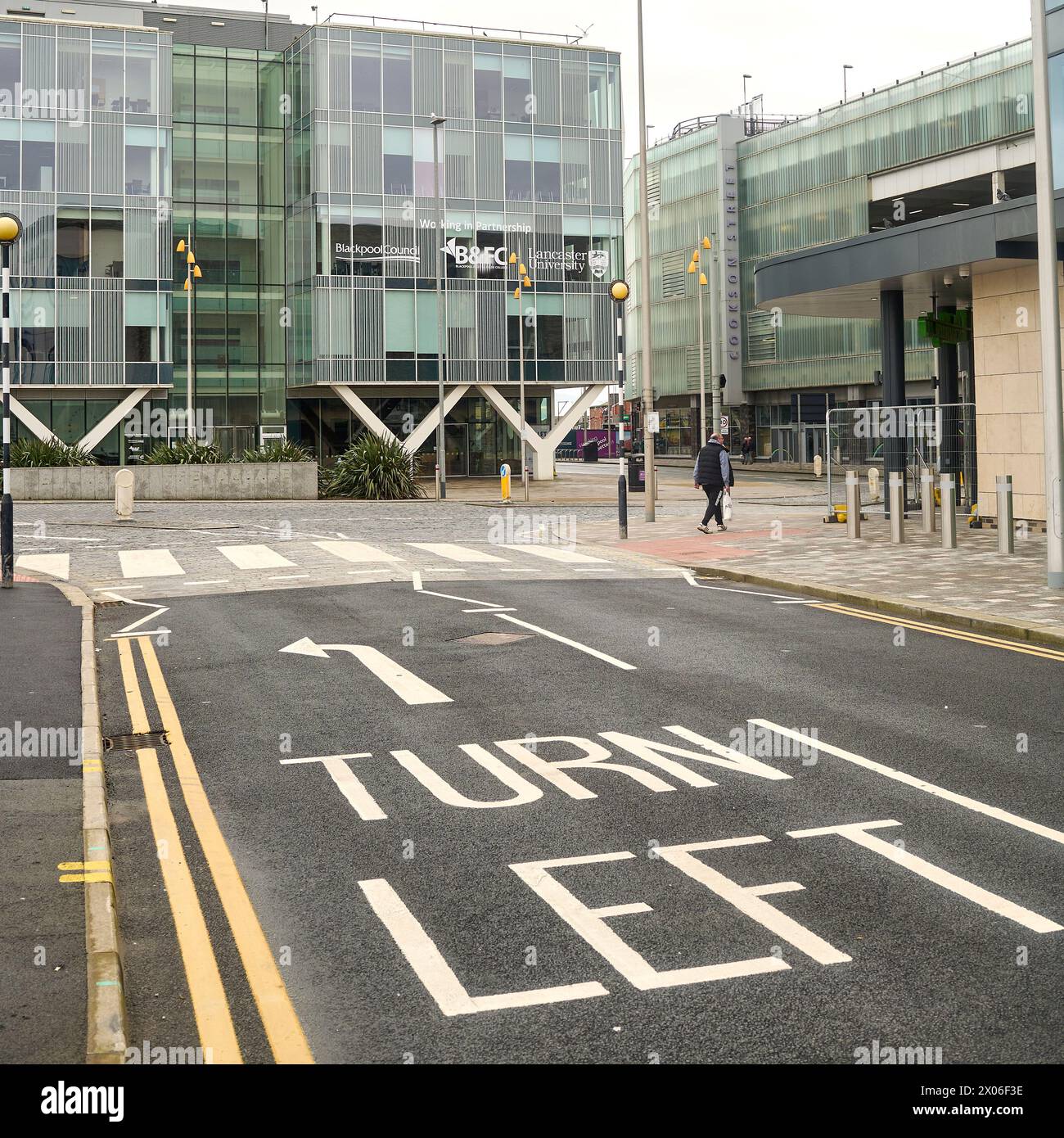 Turn left road sign in Blackpool town centre Stock Photo - Alamy