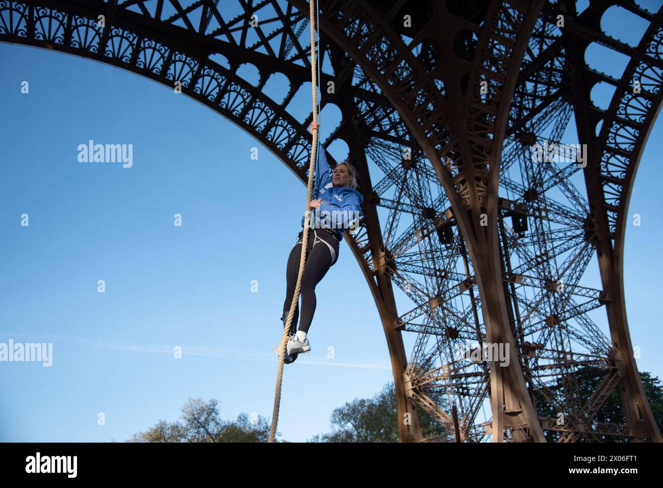 Paris, France. 10th Apr, 2024. Anouk Garnier breaks the world record for climbing the Eiffel ...