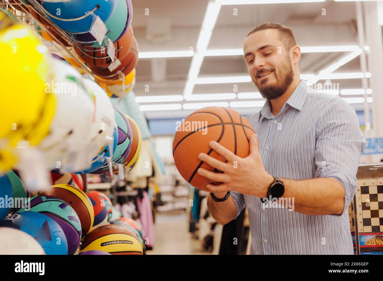 Young man in supermarket chooses hi-res stock photography and images ...