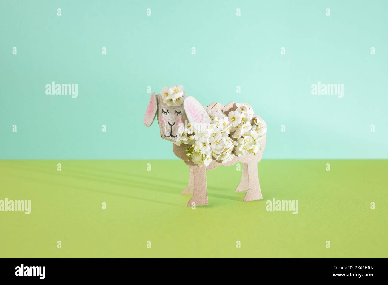 Spring sheep craft made from recycled toilet paper roll and flowers ...