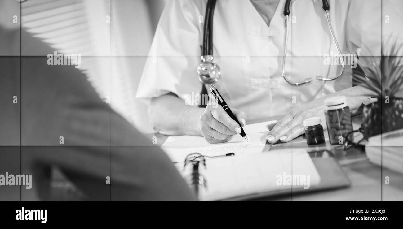 Female doctor writing prescription to her patient in medical office ...