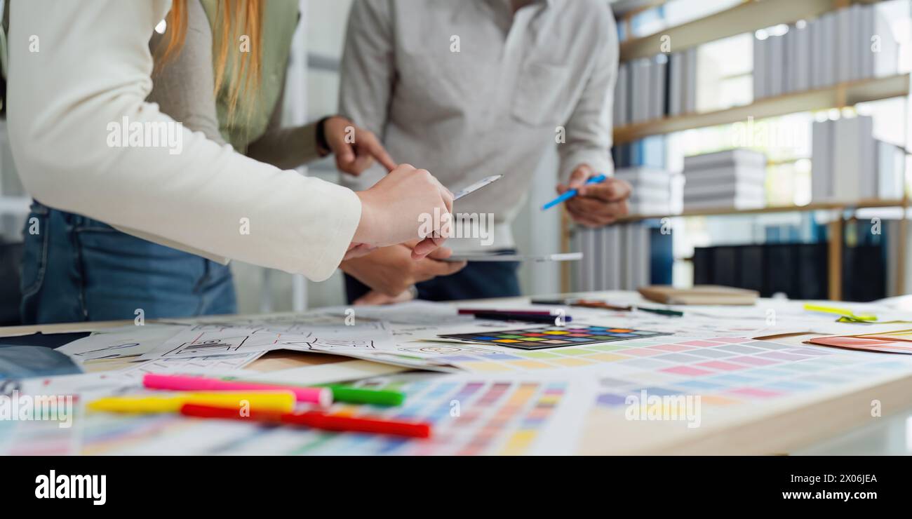 team of UI UX web designer are working together to develop mobile ...
