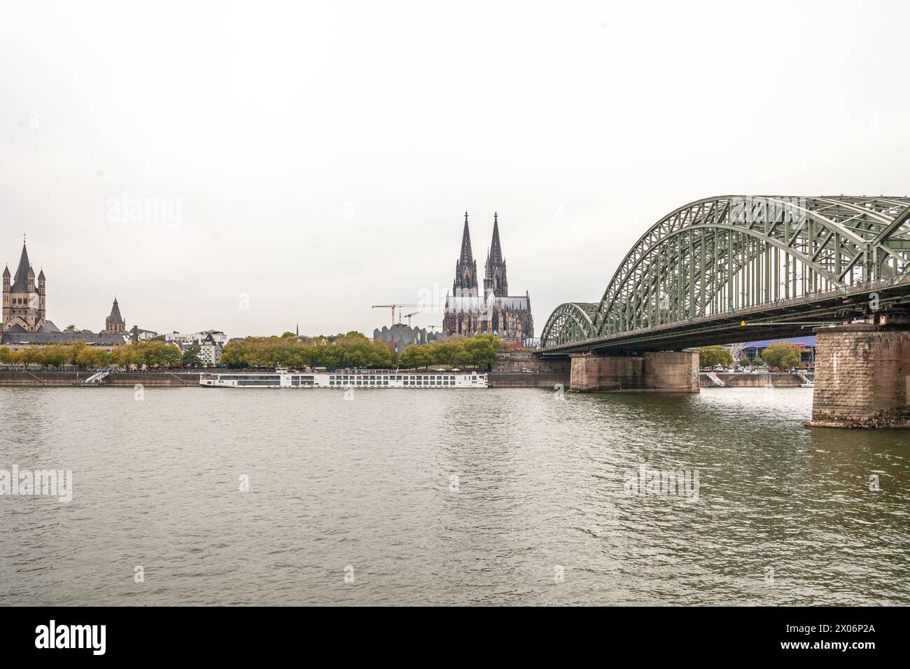 Panoramic photo of the Rhine embankment in Cologne. Hohenzollern Bridge ...