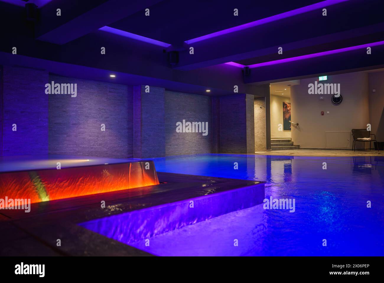 Luxury Indoor Swimming Pool Area with Ambiance Lighting, Textured Stone ...