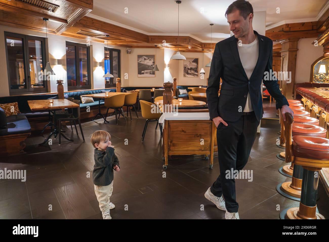 Luxury hotel bar scene with cozy alpine aesthetic, Zermatt, Switzerland ...