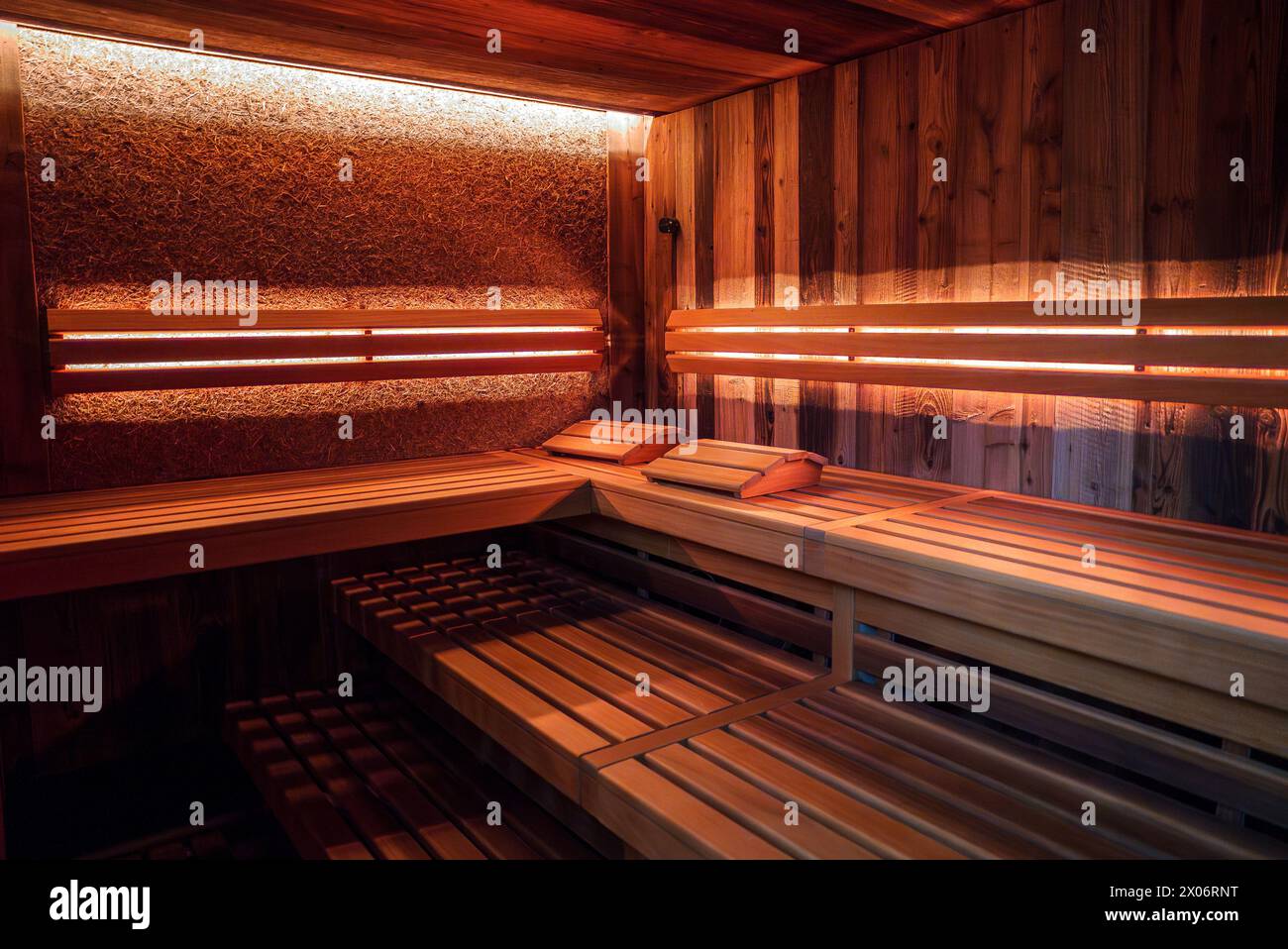 Cozy Wooden Sauna with Light Colored Walls, Infrared Heaters, and ...