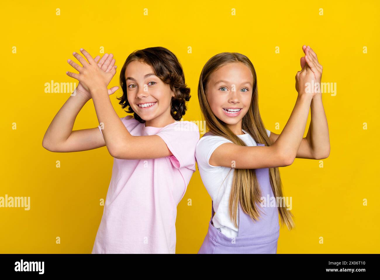 Photo of excited funky friends wear casual outfits clapping palms ...