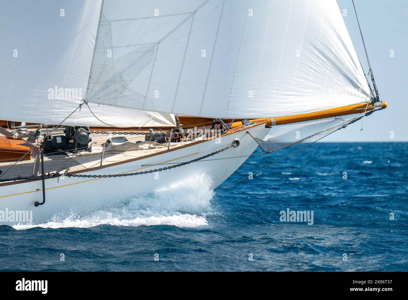 White Dacron sails on a classic wooden sail boat with wooden masts ...