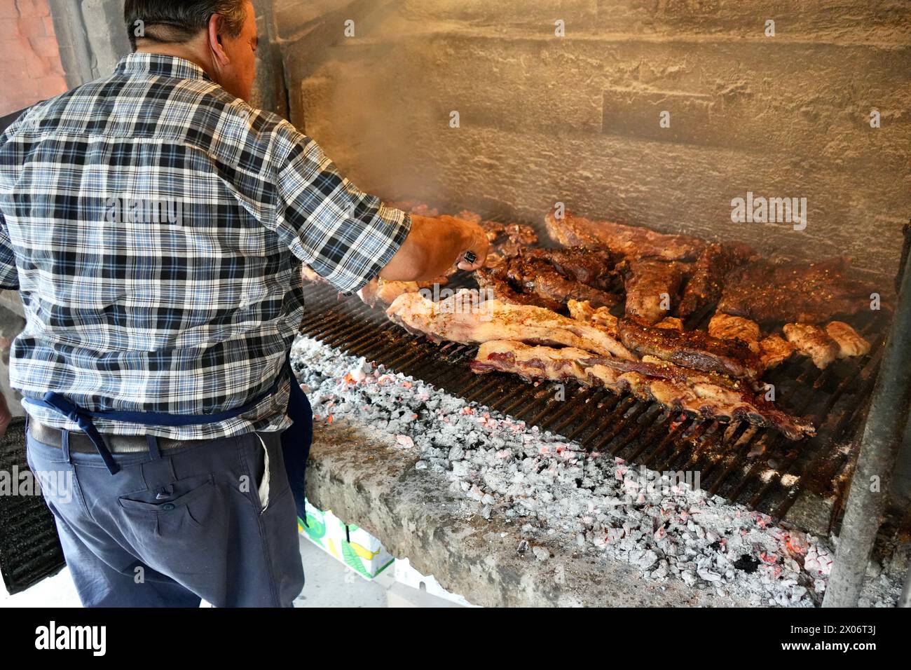 Man cooking roast chicken hi-res stock photography and images - Alamy