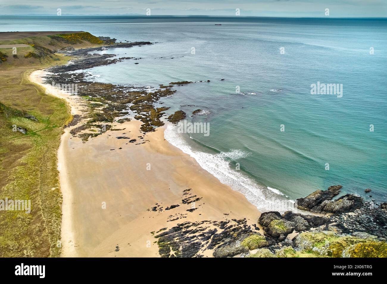 Sunnyside Beach Cullen Scotland a sand beach with rock formations and ...