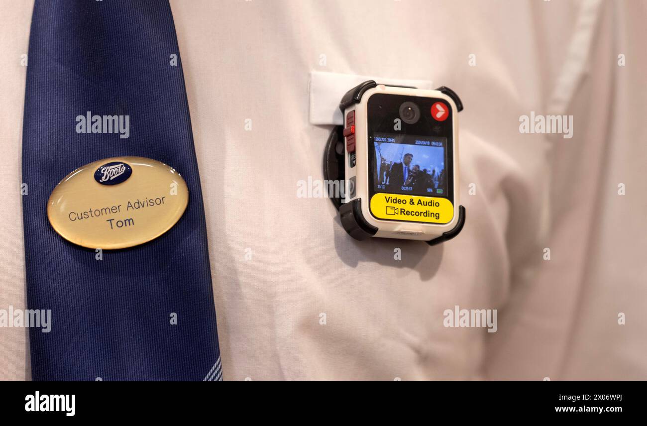 The image of Prime Minister Rishi Sunak is shown on a small screen on a ...