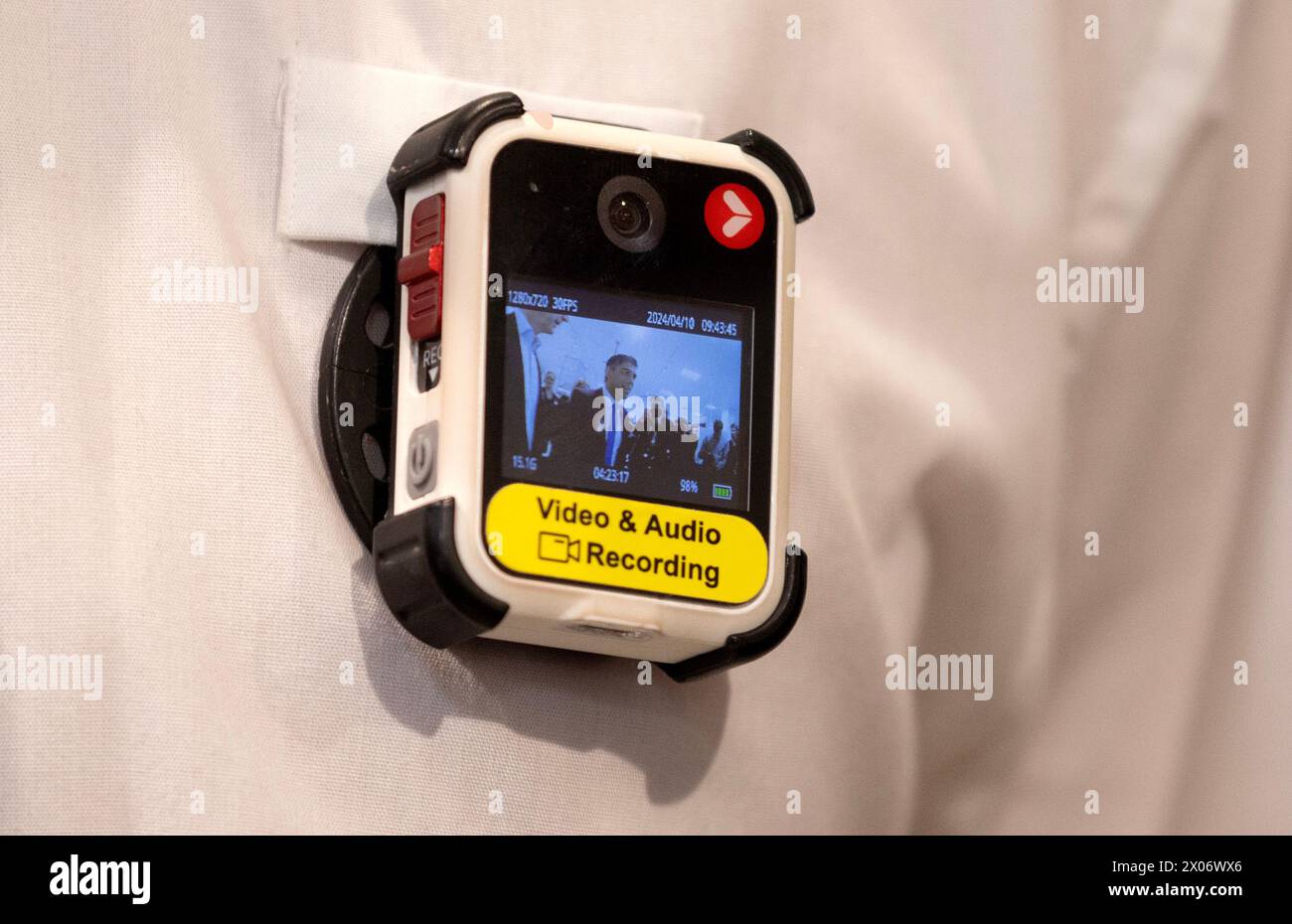 The image of Prime Minister Rishi Sunak is shown on a small screen on a ...