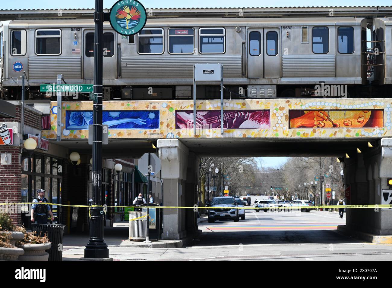 Crime scene tape blocks off the area, in Chicago at a shooting that ...