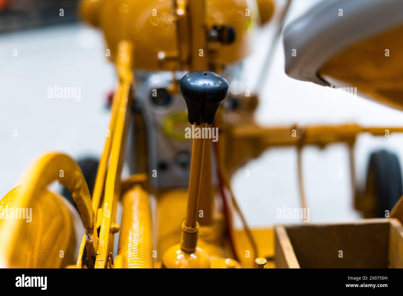 Small yellow tractor in exhibition, closeup details, wheels Stock Photo ...