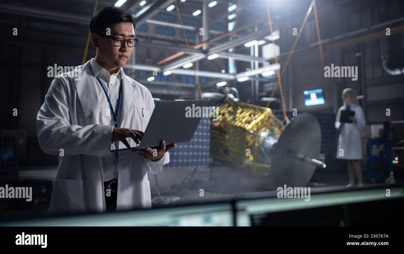 Black male scientist asian female hi-res stock photography and images ...
