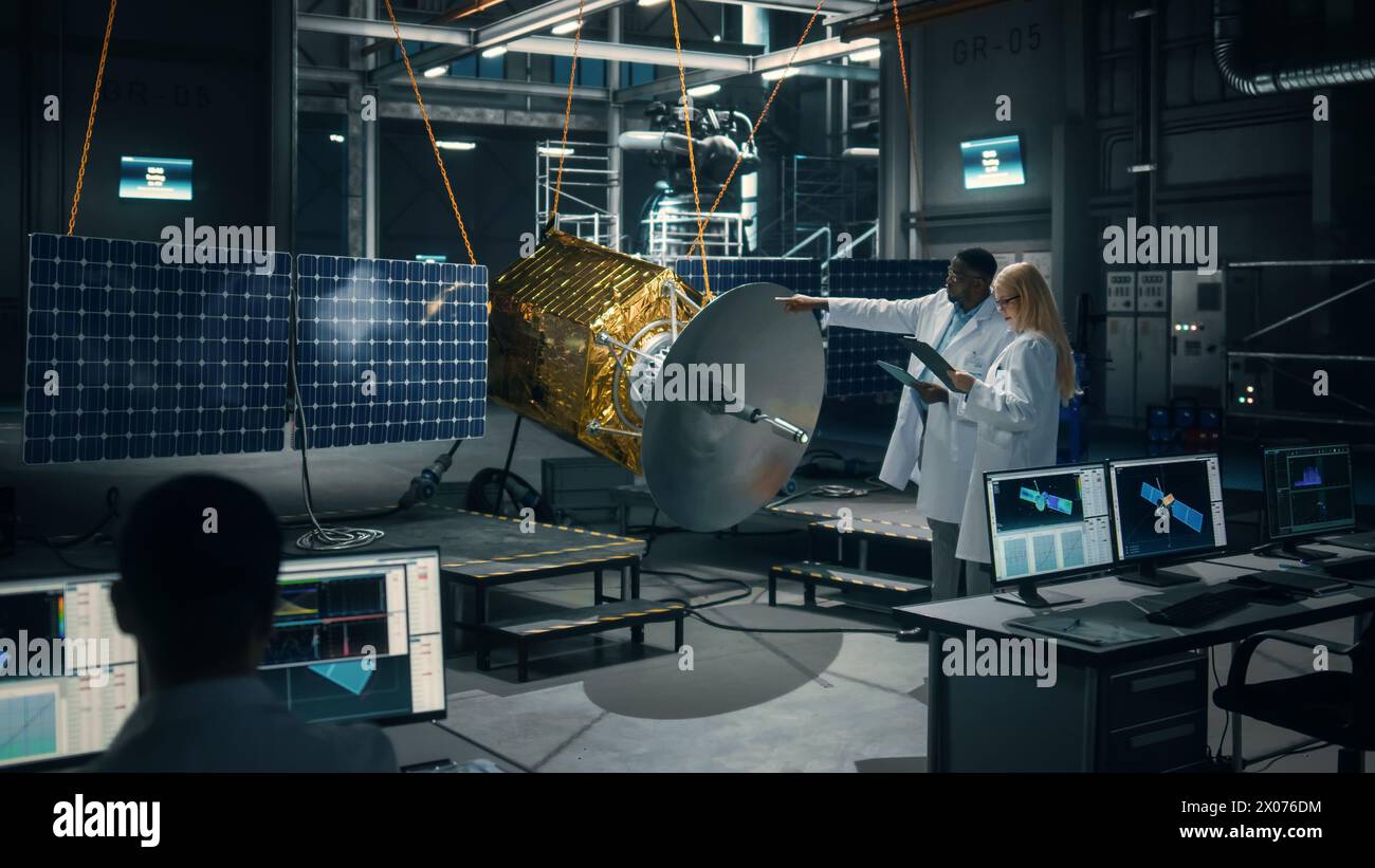 Team of Engineers Working on Satellite Construction. Aerospace Agency ...