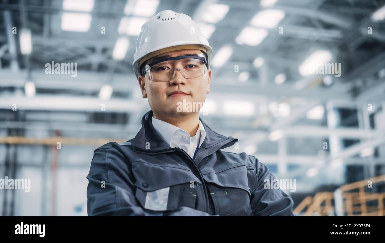 Portrait of a Professional Asian Heavy Industry Engineer Wearing Safety ...