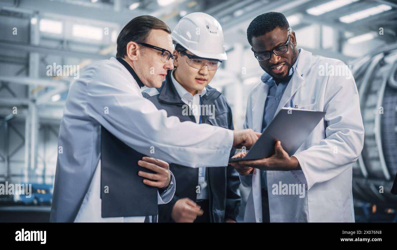 Team of Diverse Professional Heavy Industry Engineers Wearing Safety ...