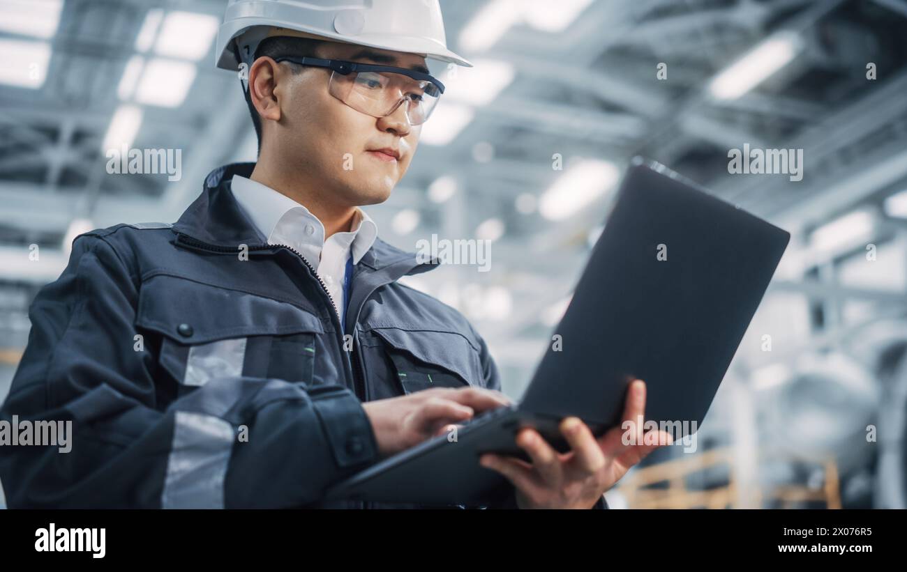 Portrait of a Professional Heavy Industry Asian Engineer, Worker ...