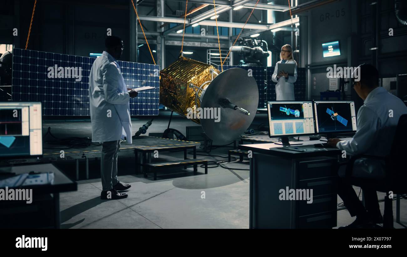 Engineer and Technician Working on Satellite Construction. Aerospace ...