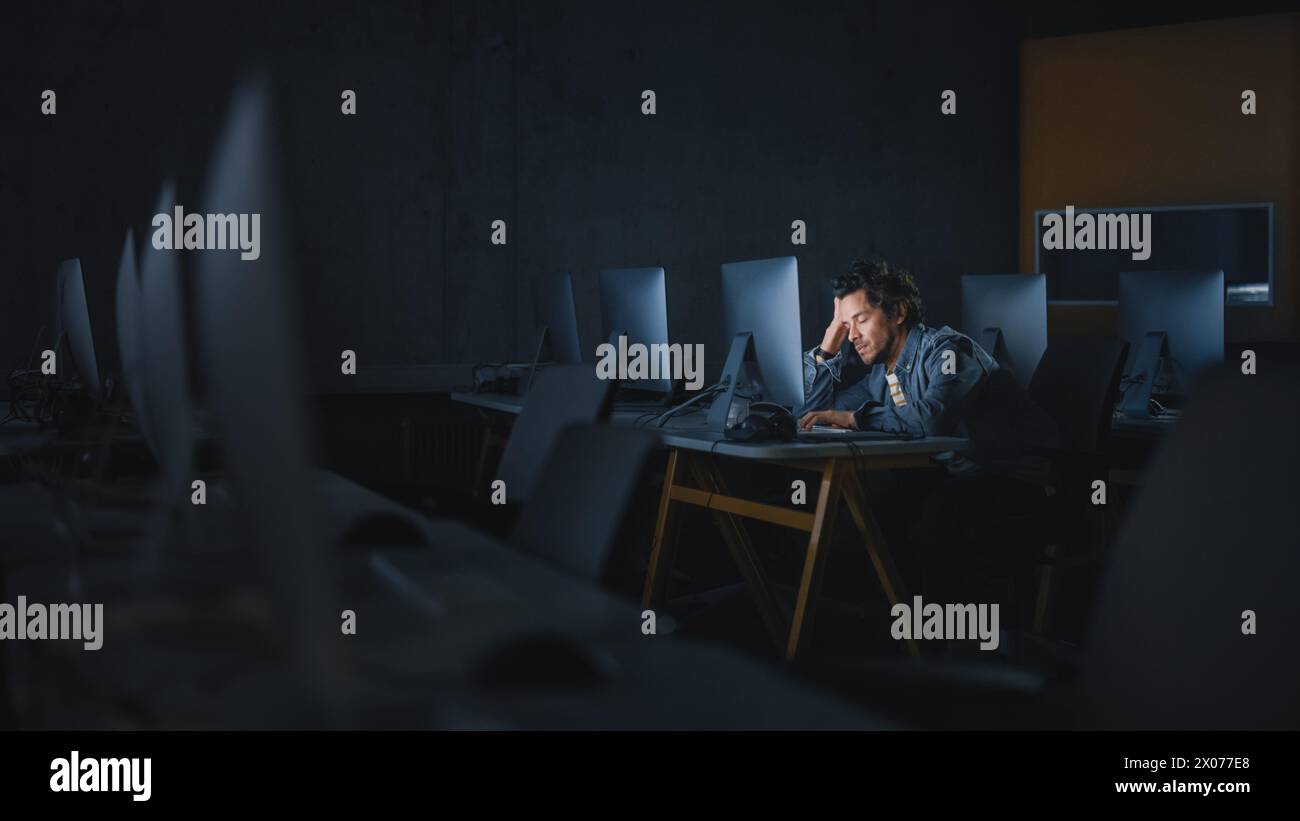 Stressed Male Student Sitting Alone in College Informatics Room ...