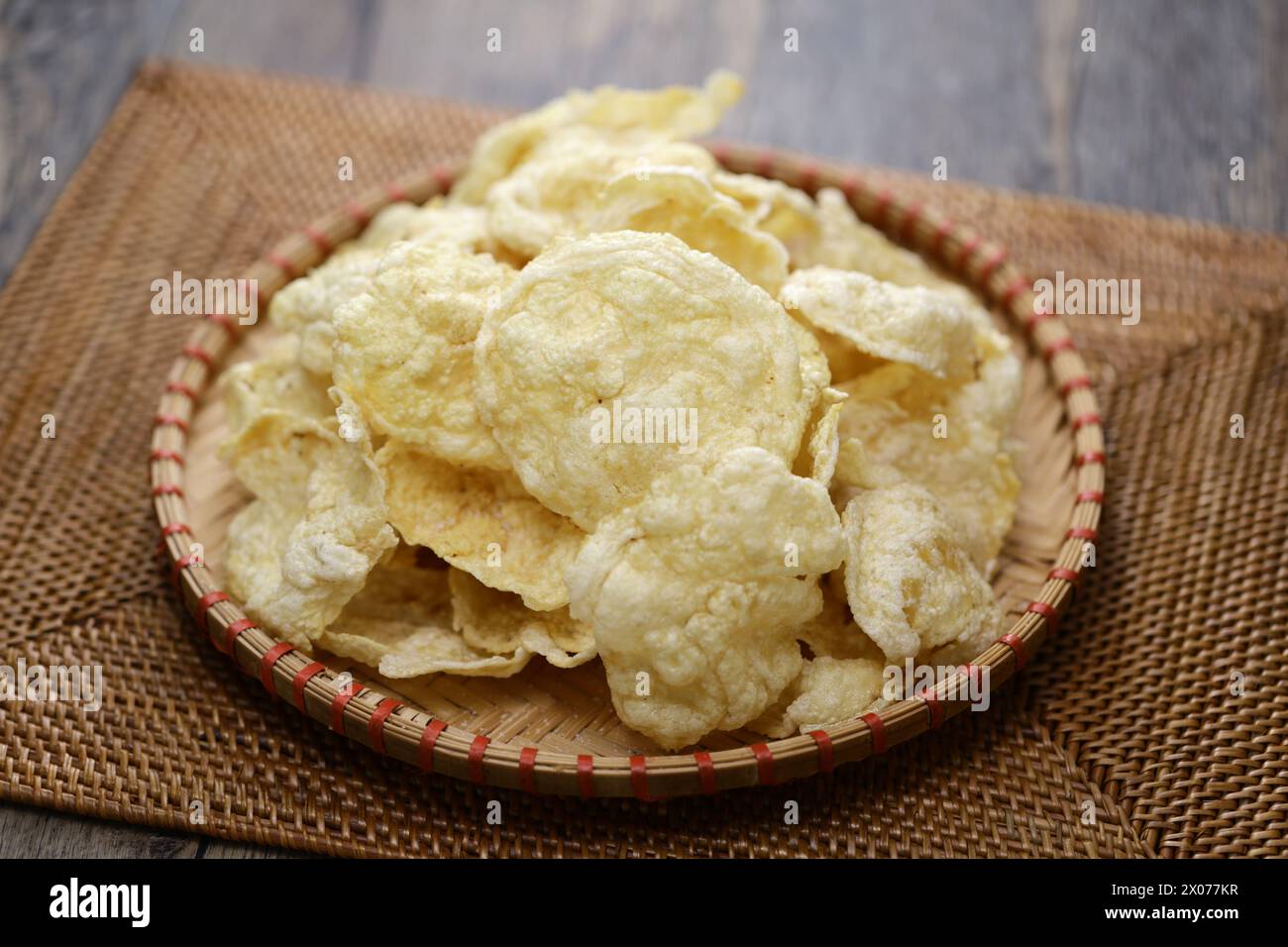 Emping, Indonesian crackers made from crushed Belinjo nuts. After ...