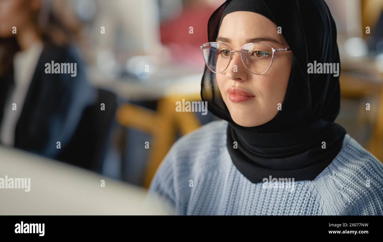 Beautiful Portrait of a Female Muslim Student in Hijab, Studying in ...
